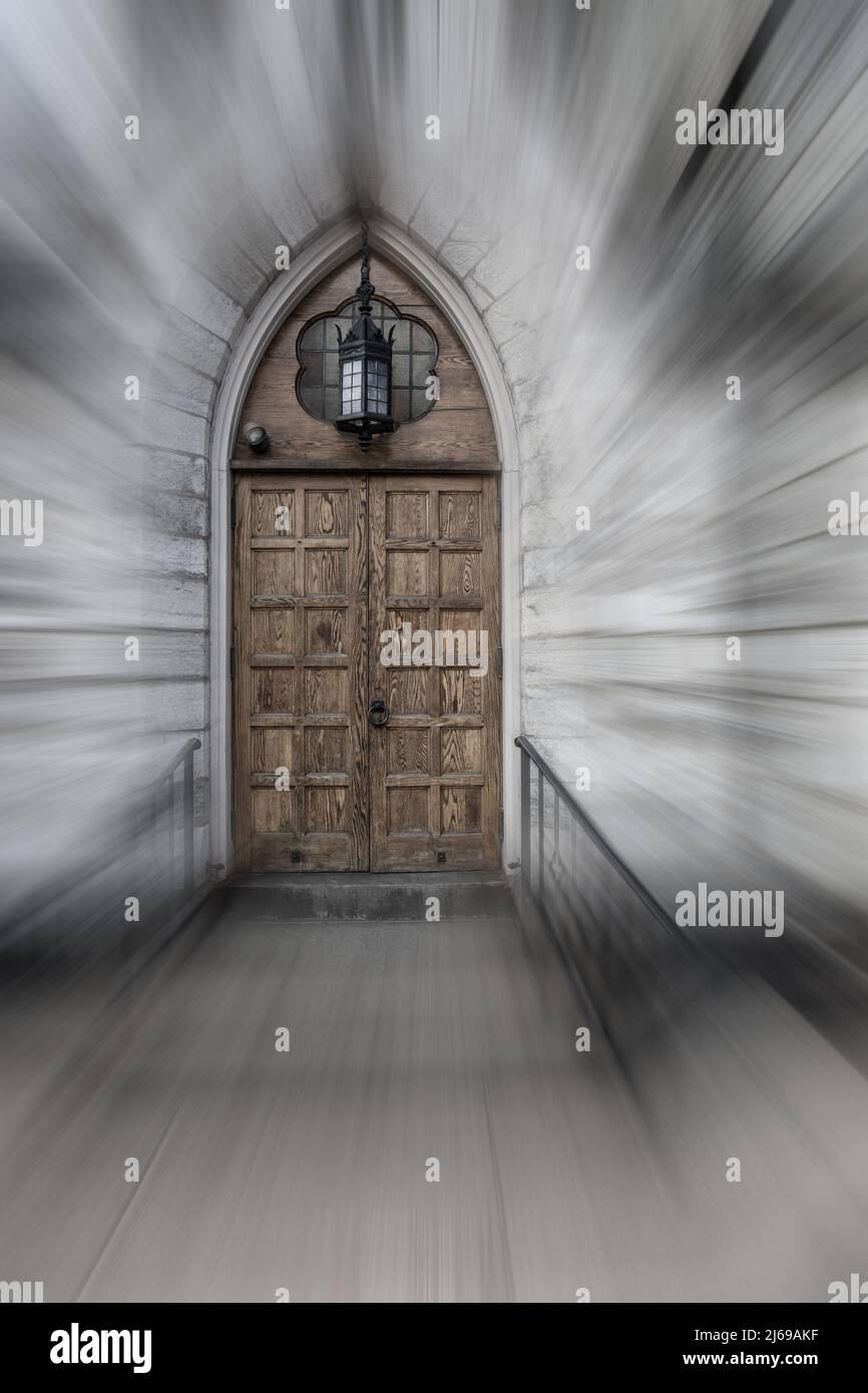 Gothic Style Door to a stone church with motion blur Stock Photo - Alamy