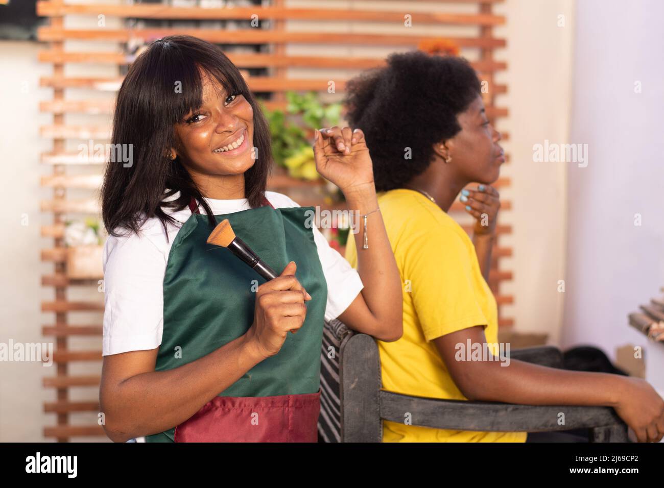 portrait of an african makeup artist Stock Photo - Alamy