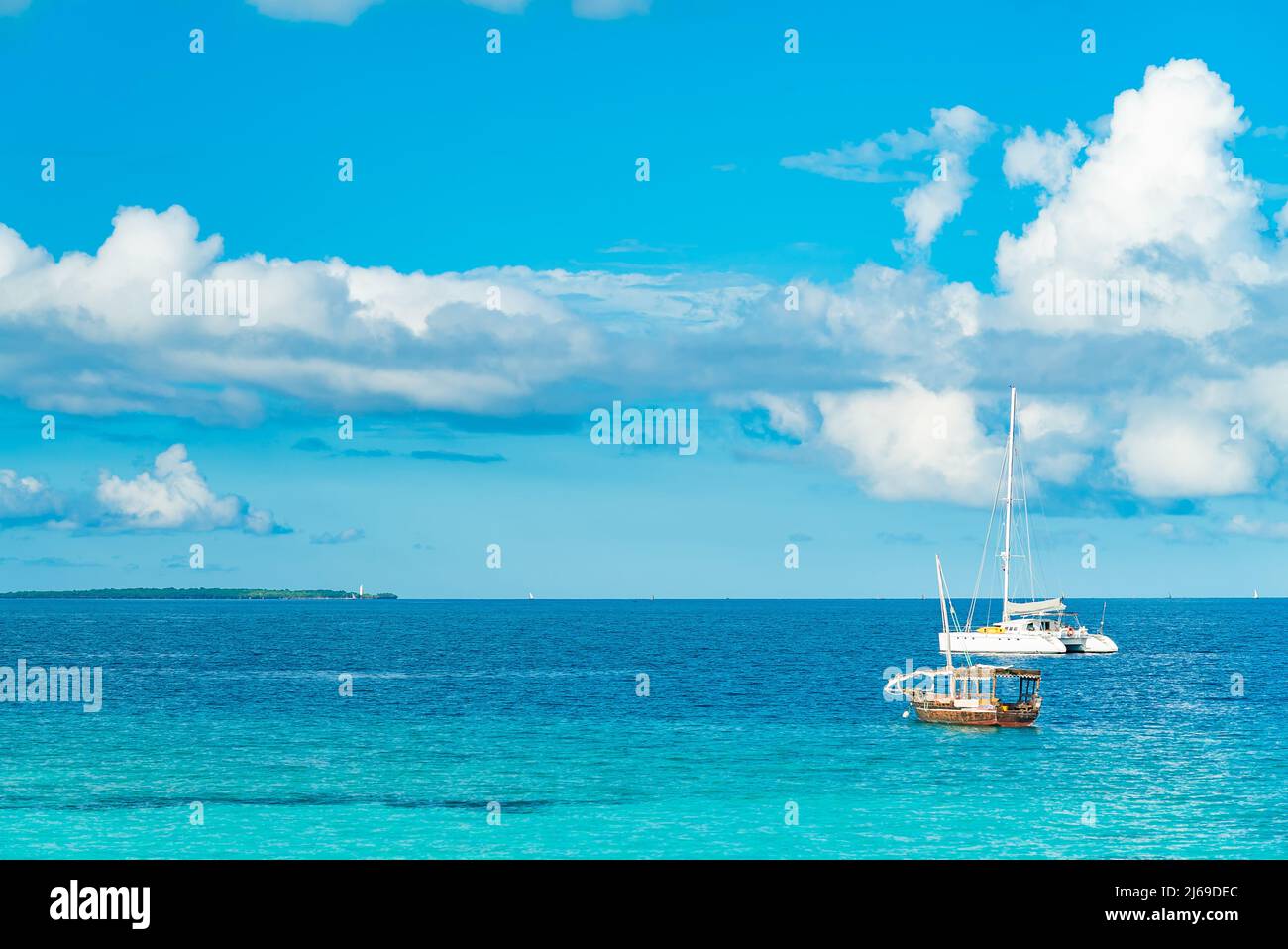 Fishing ship in water of Indian ocean. Zanzibar, Tanzania Stock Photo ...