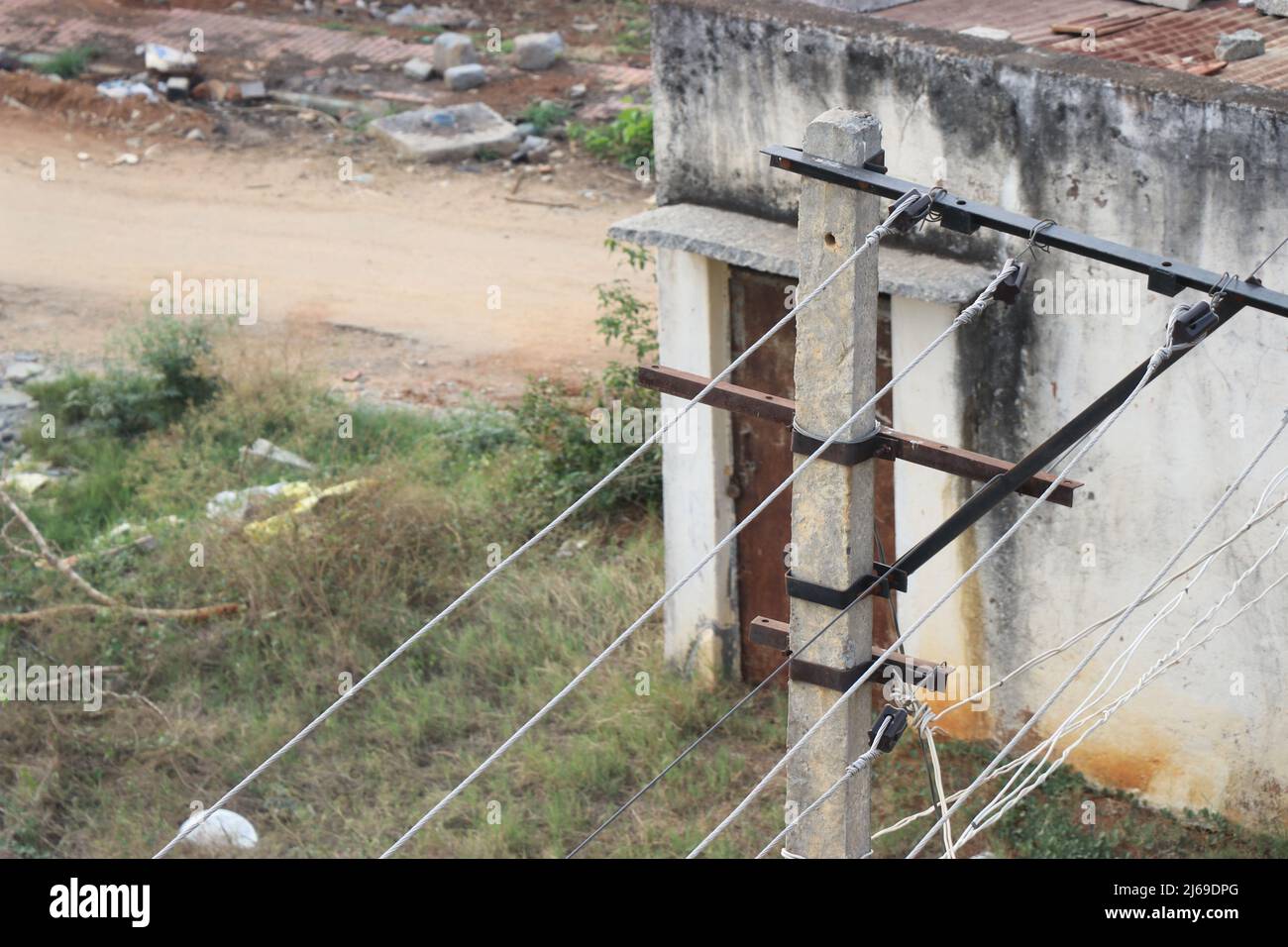 Rural Electric power cables carry electricity on a concrete pole ...