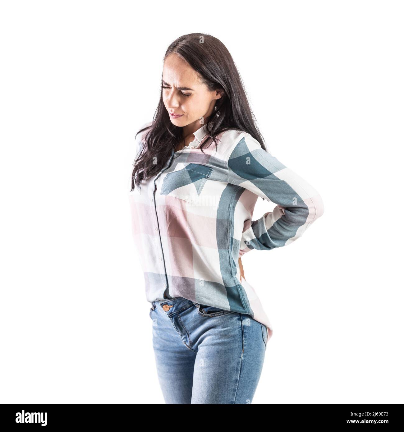 A young woman has very severe back pain. Isolated on white Stock Photo ...