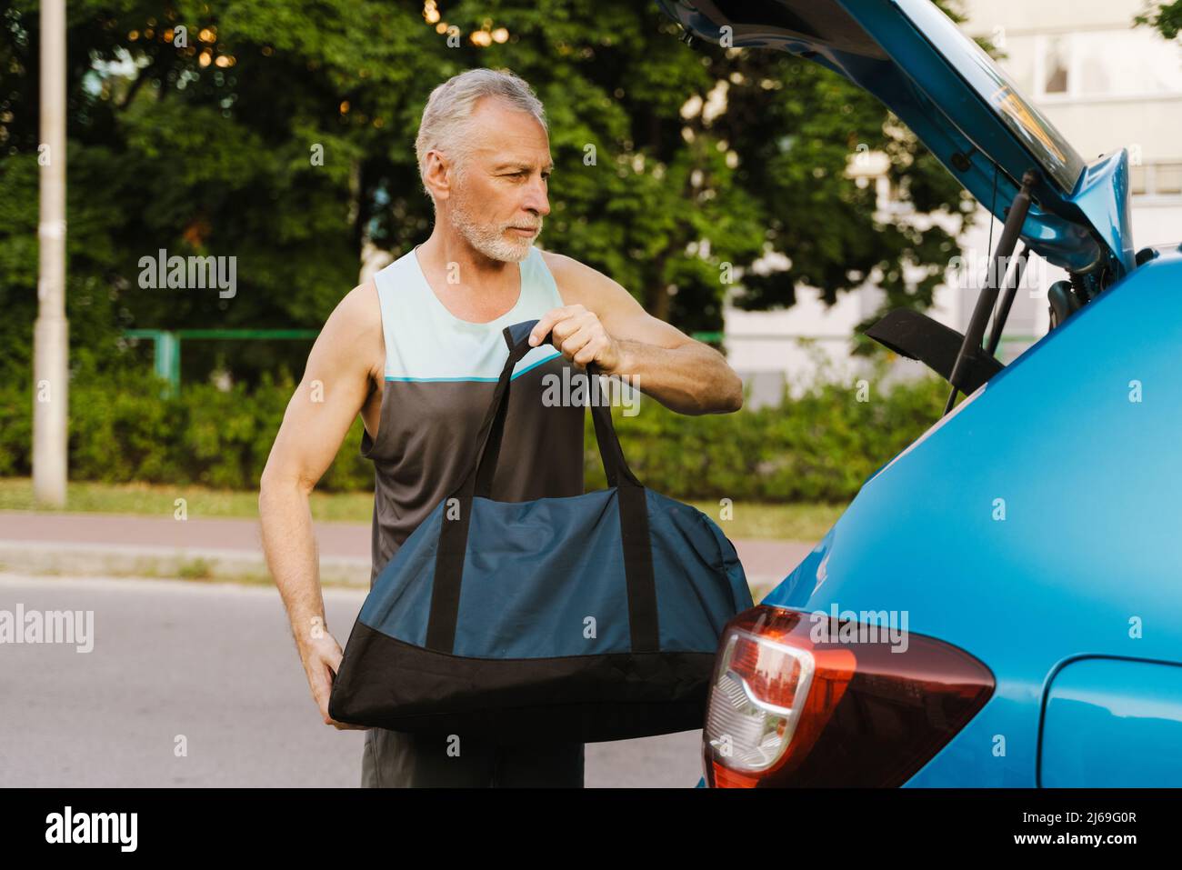 Senior getting out car hi-res stock photography and images - Alamy