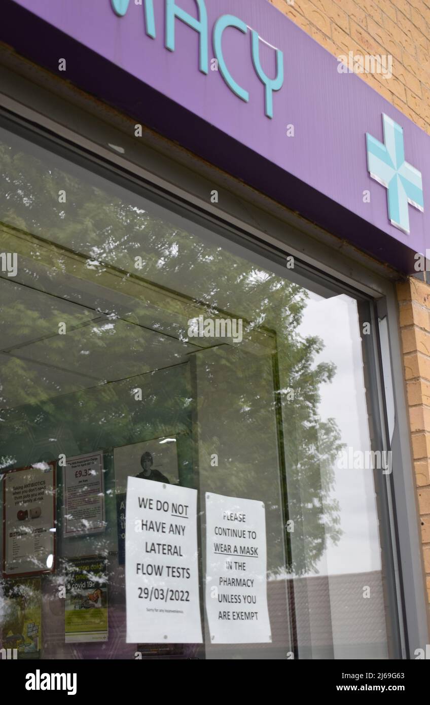 Sign in pharmacy window: "We do not have any lateral flow tests Stock ...