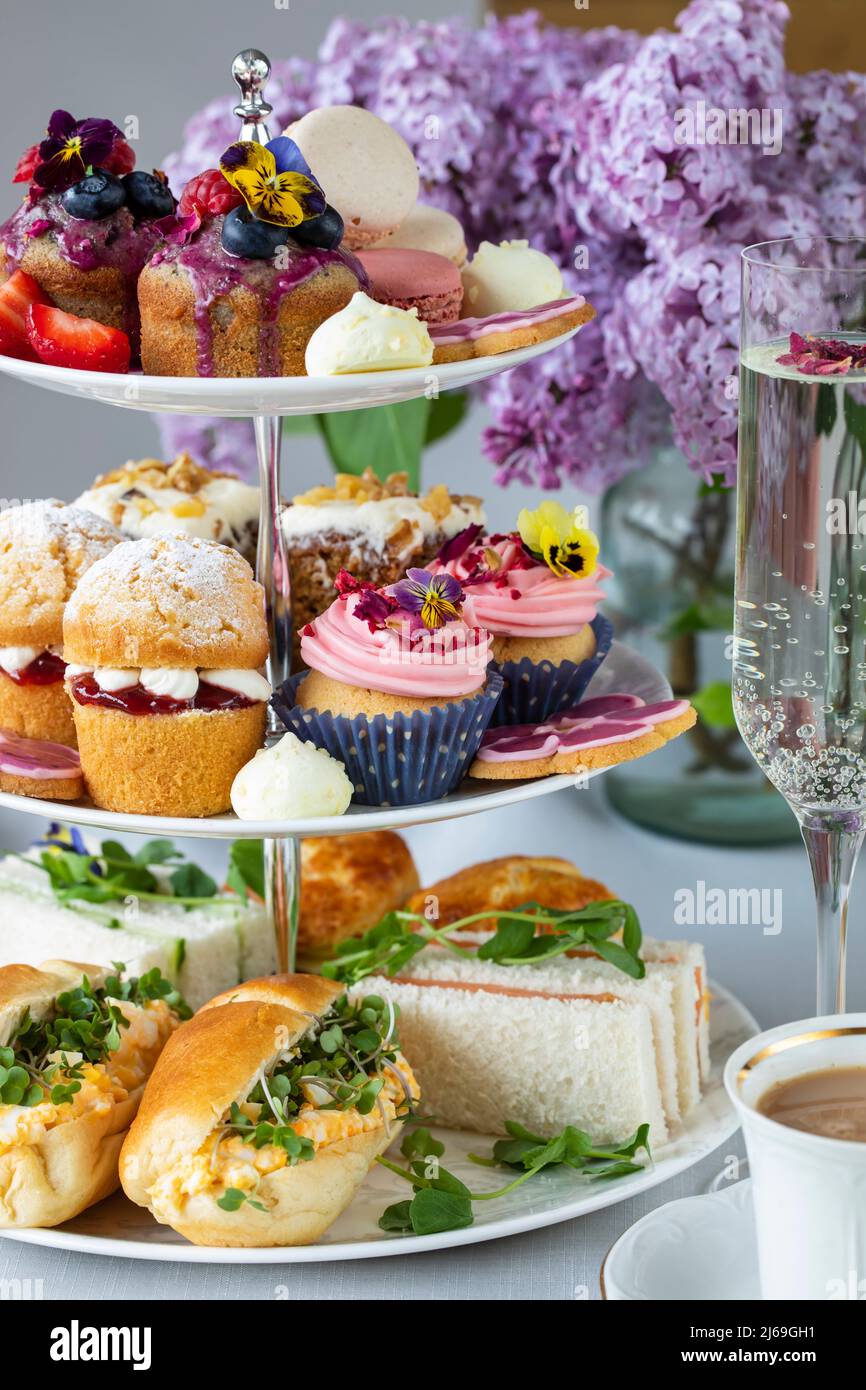 Traditional english afternoon tea with selection of cakes and ...