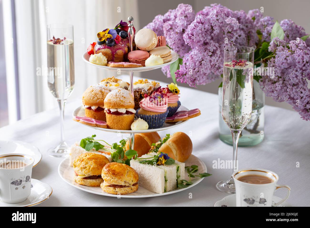 Traditional english afternoon tea with selection of cakes and ...