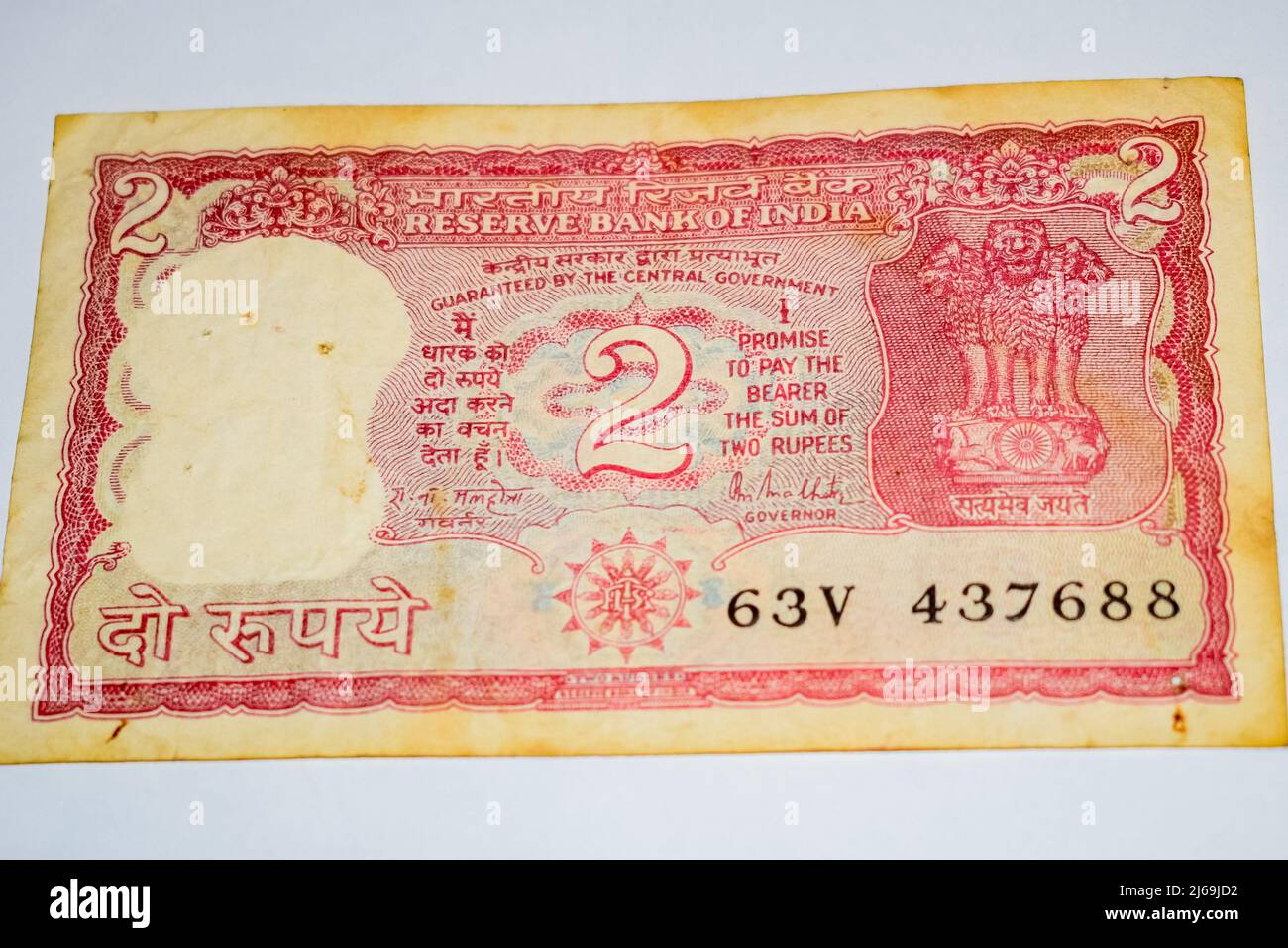 Old Two Rupee notes combined on the table, India money on the rotating ...