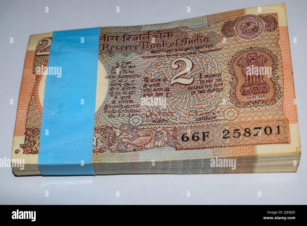 Old Two Rupee notes combined on the table, India money on the rotating ...