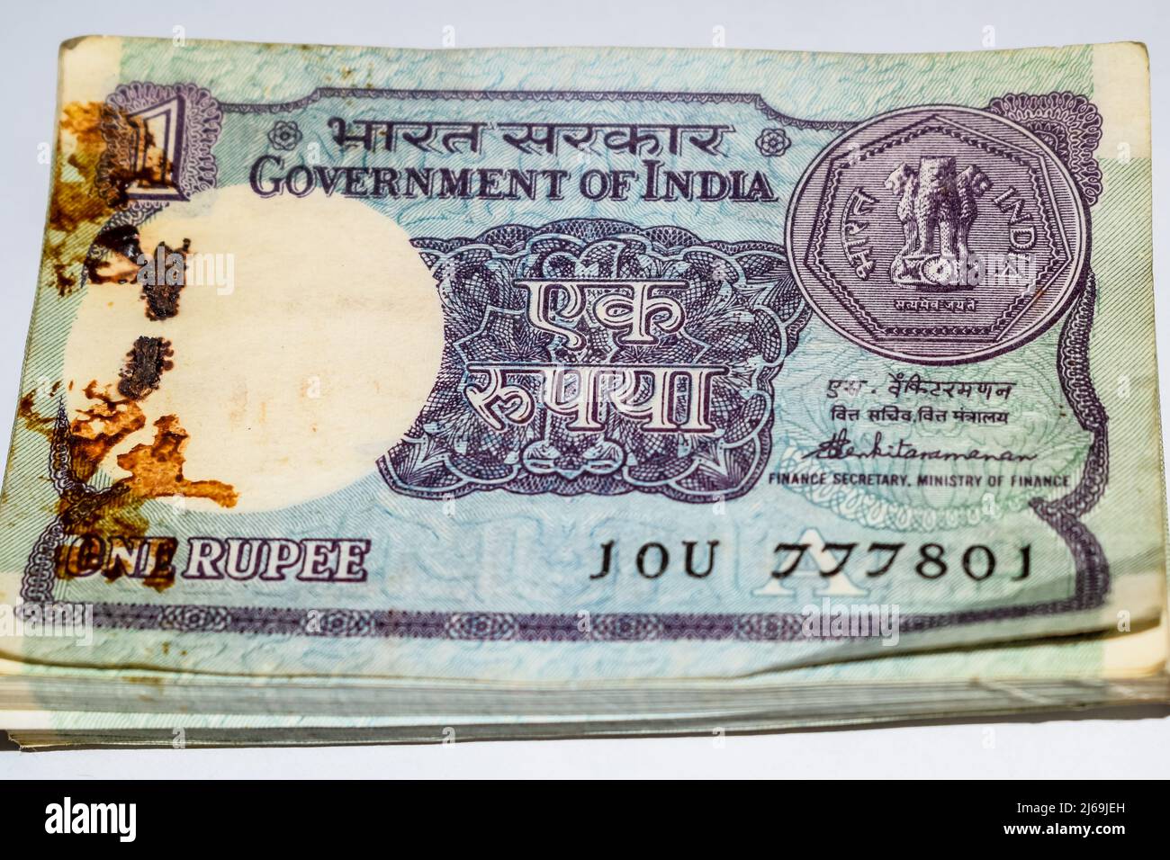 Old One Rupee notes combined on the table, India money on the rotating ...