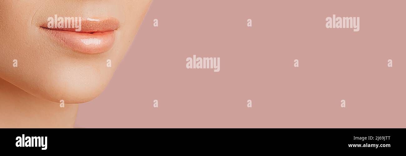 Female lips. Beautiful sensual young girl with clean skin. Woman close ...