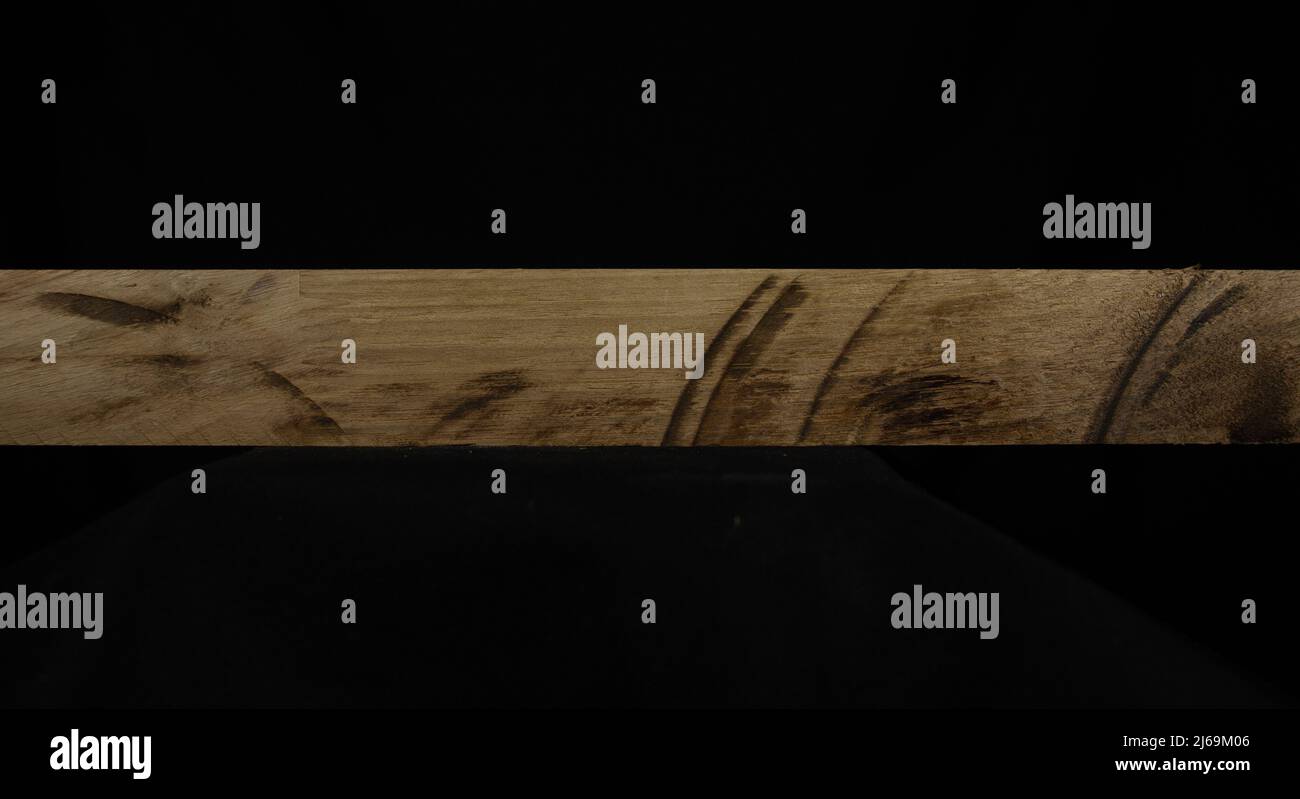 edge view of walnut solid block worktop with skill saw burn marks ...