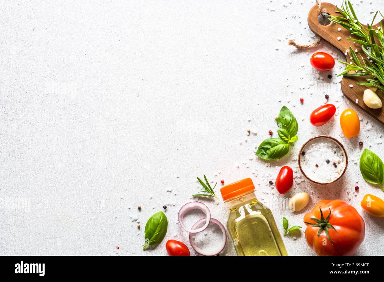 Food cooking background on white stone table Stock Photo - Alamy
