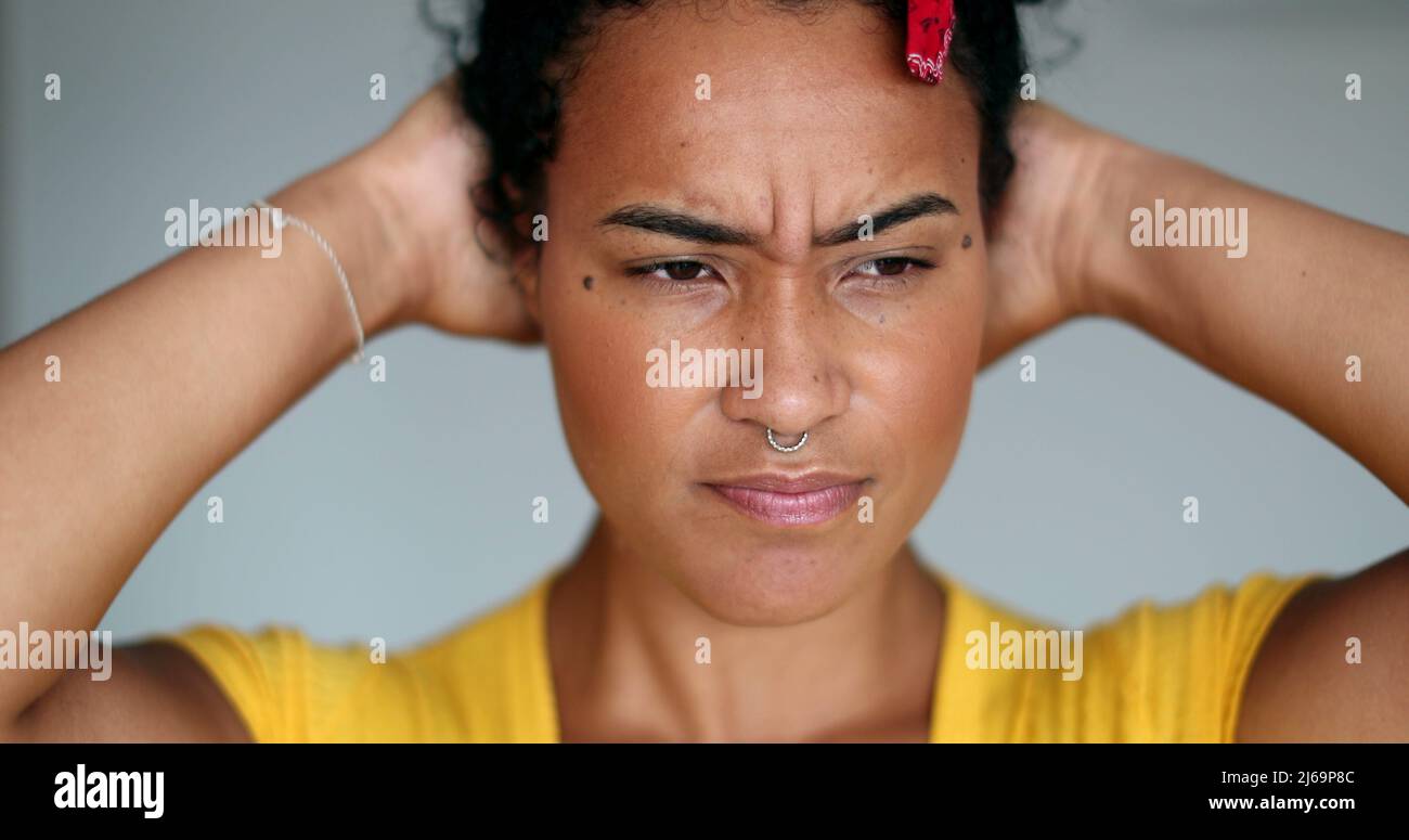 Stressed young black woman. Afrtican girl concerned expression face ...