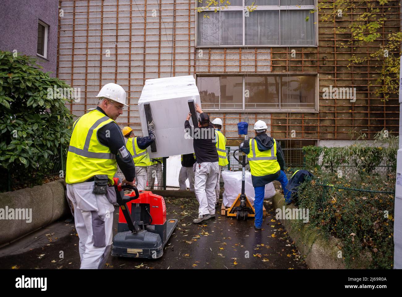 Paris, France, Construction Workers on Site using Insulation Materials ...