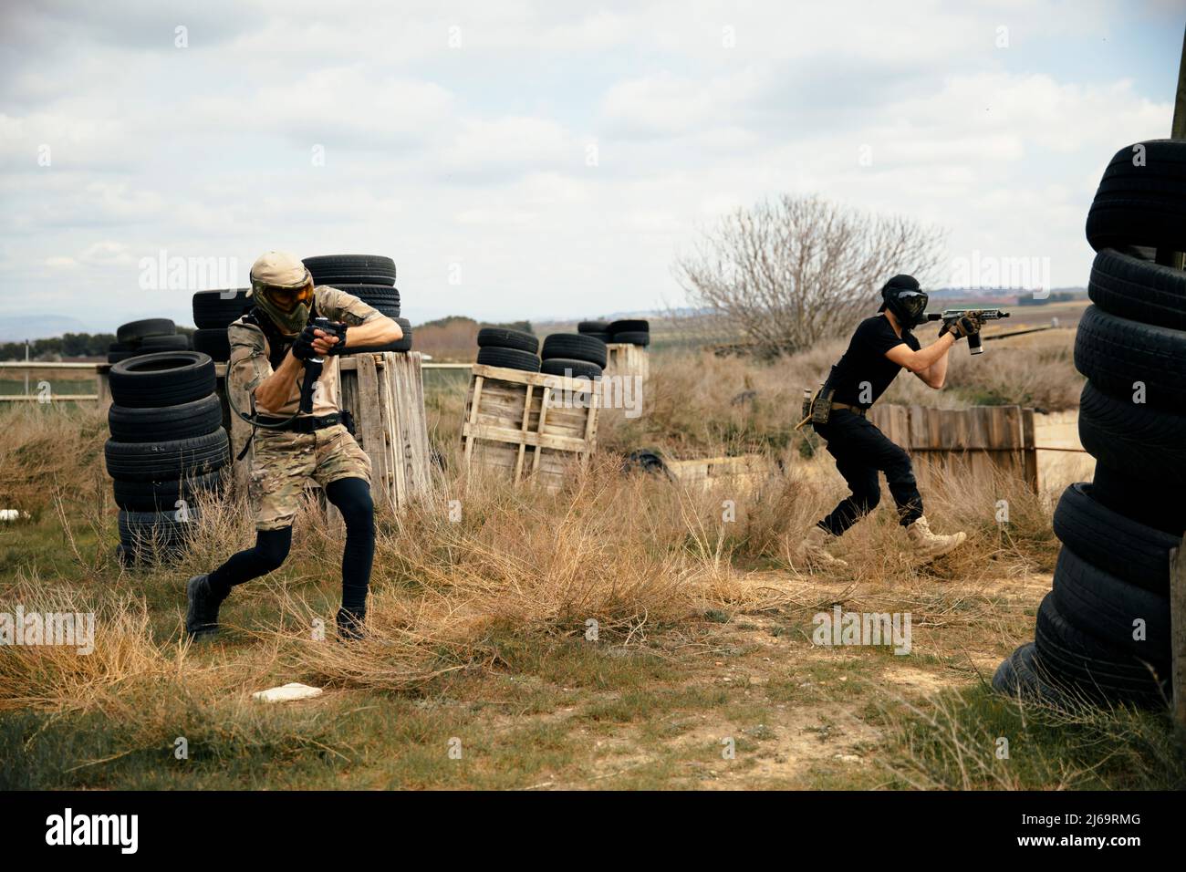 Soldiers carefully advancing position in the middle of an airsoft game ...