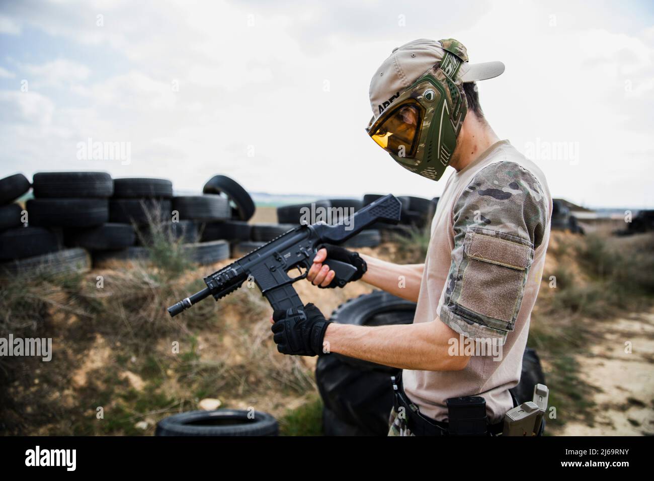 Soldier getting ready for a game of airsoft Stock Photo - Alamy