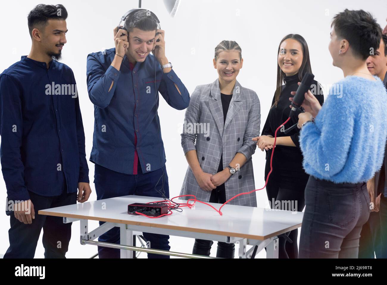 Students with video camera in computer lab, Filming in a Studio ...
