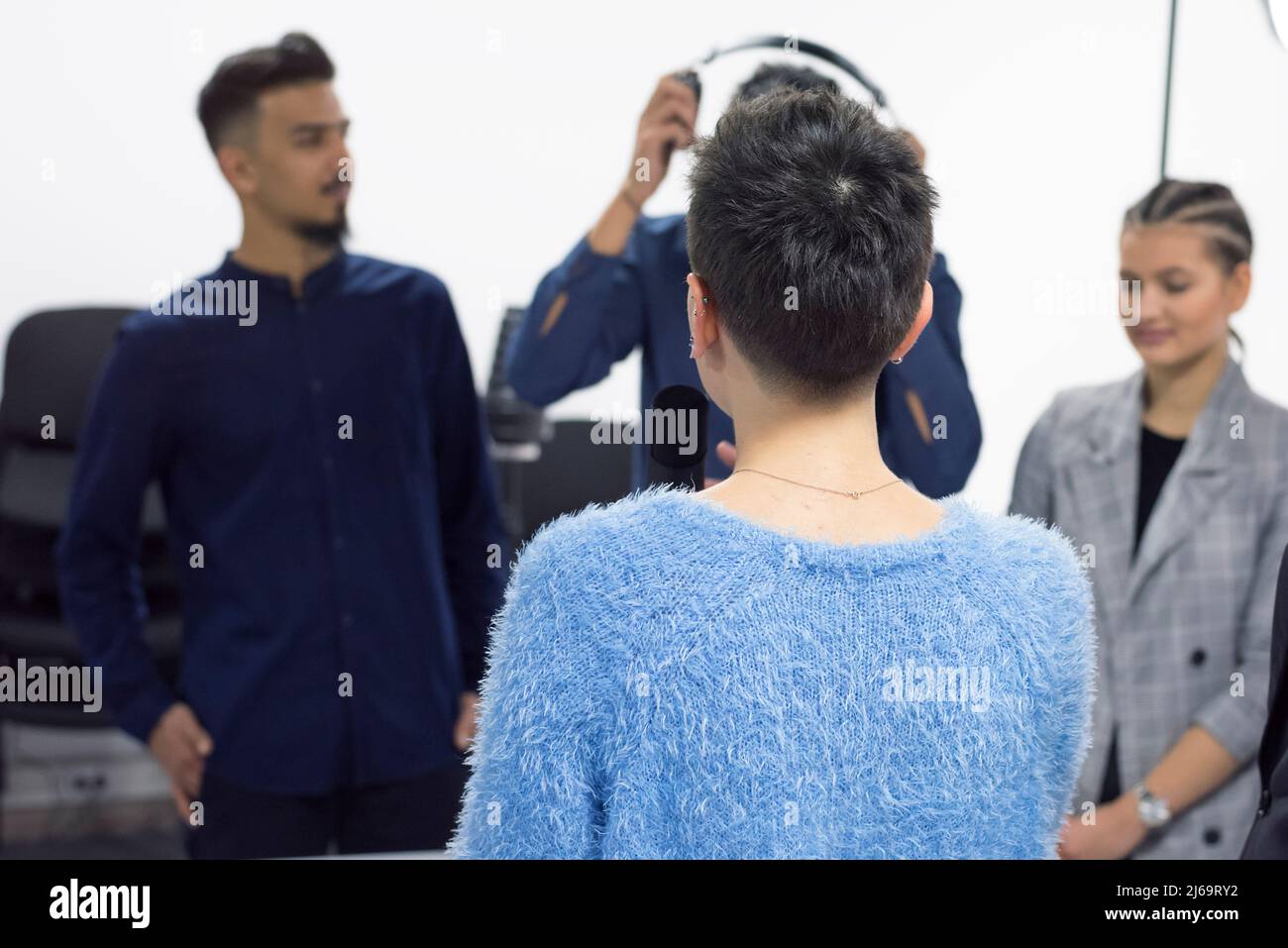 Students with video camera in computer lab, Filming in a Studio ...