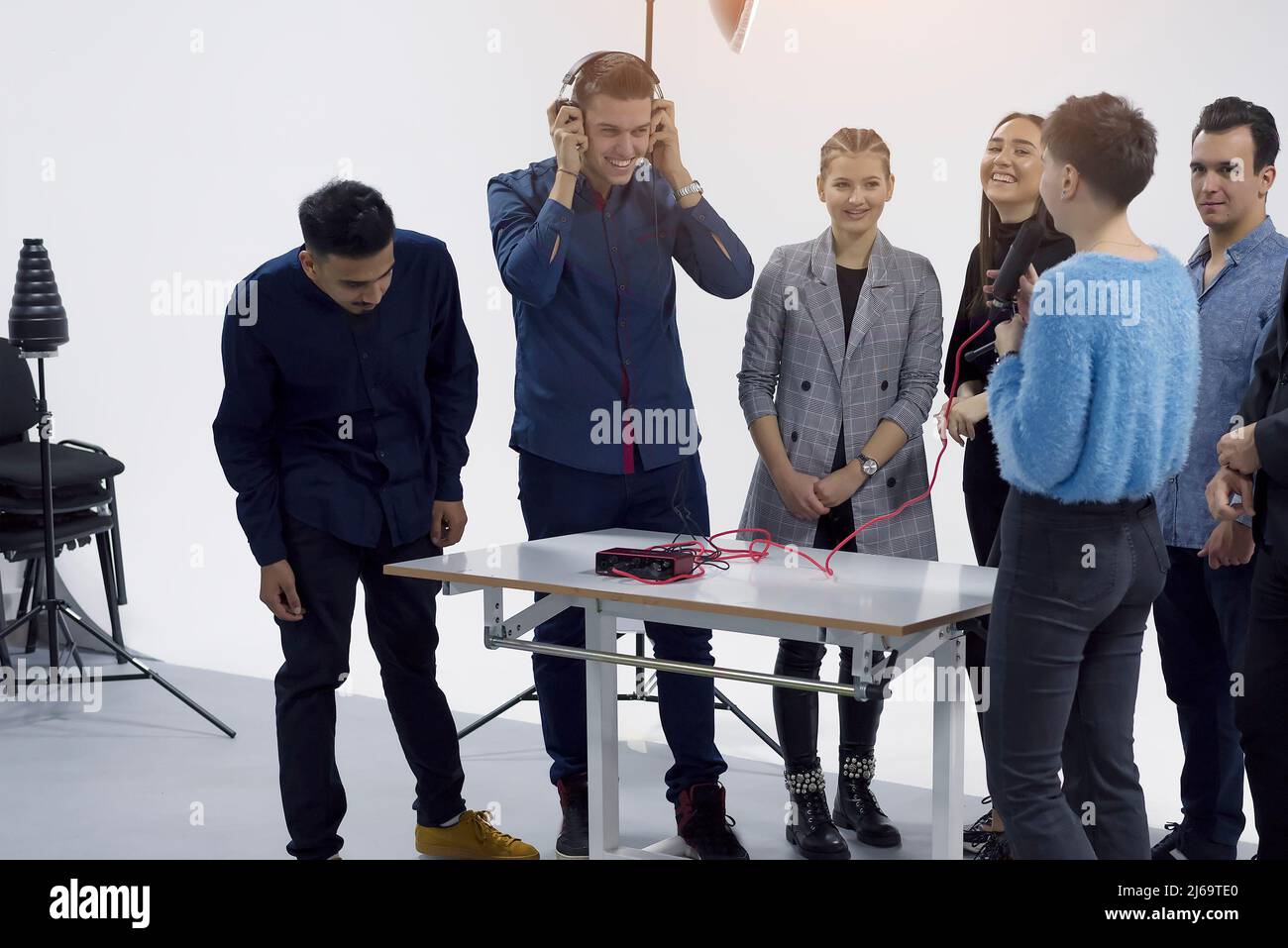 Students with video camera in computer lab, Filming in a Studio ...