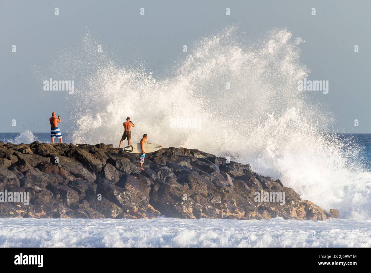 Sunset on the beach, big waves breaking against breakwater. Play Stock ...