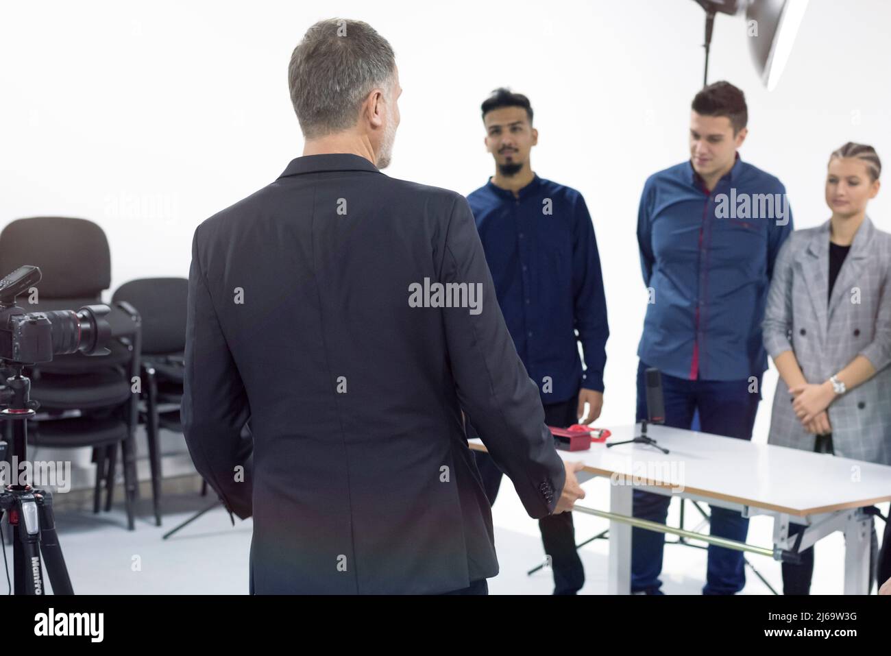Students with video camera in computer lab, Filming in a Studio ...