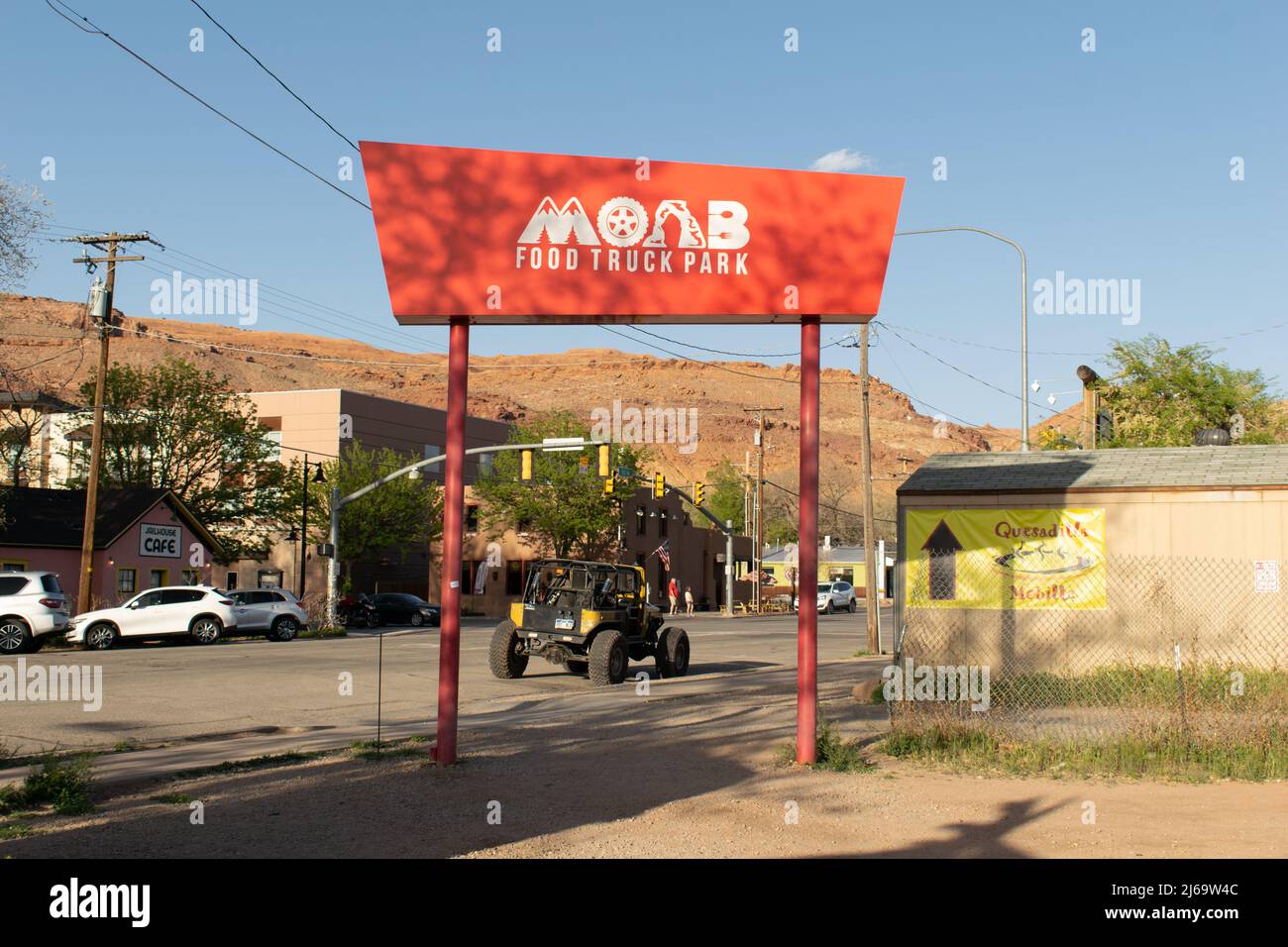 Moab Food Truck Park sign with off road vehicle parked in red arch ...