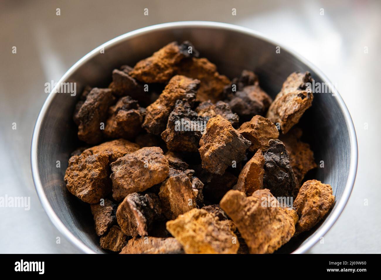 Powdered chaga mushroom powder. Medicinal chaga mushroom for bre Stock ...