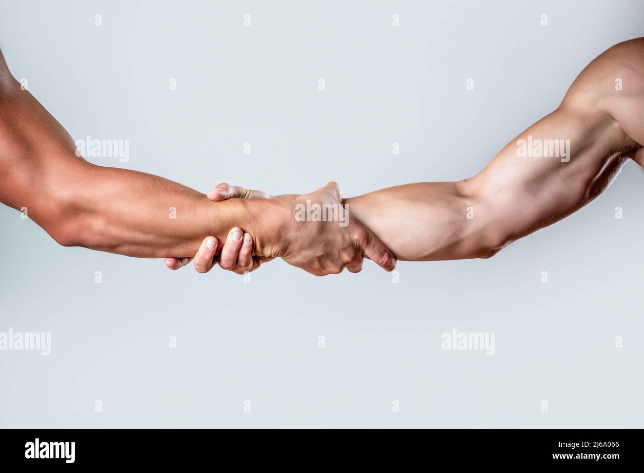 Two hands, helping arm of a friend, teamwork. Helping hand concept and ...