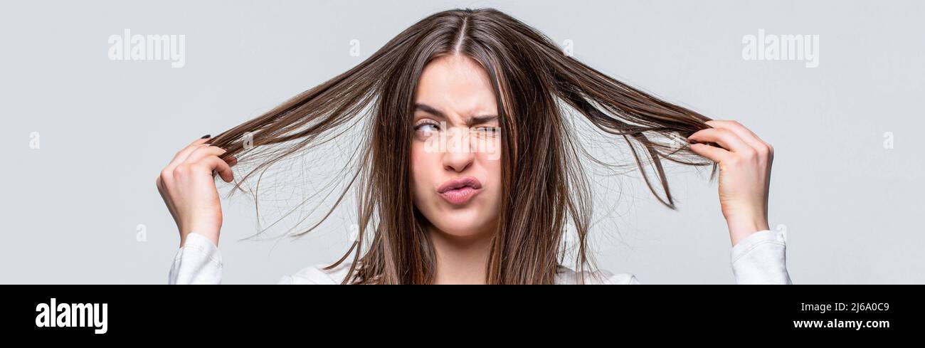 Bad hairs day. Frustrated woman having a bad hair. Woman having a bad ...
