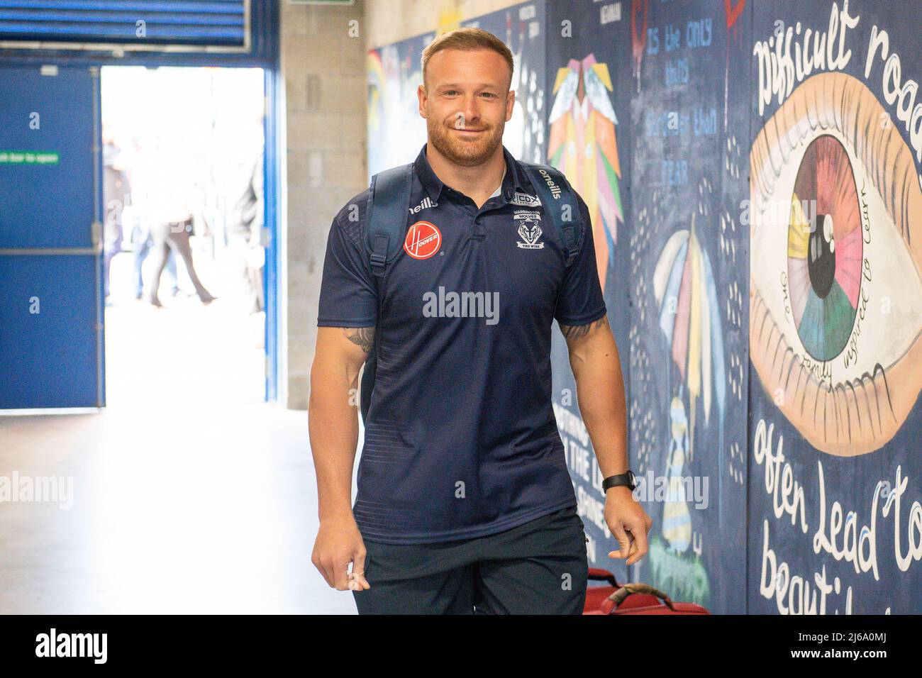 Oliver Holmes #12 of Warrington Wolves arrives at The Halliwell Jones ...