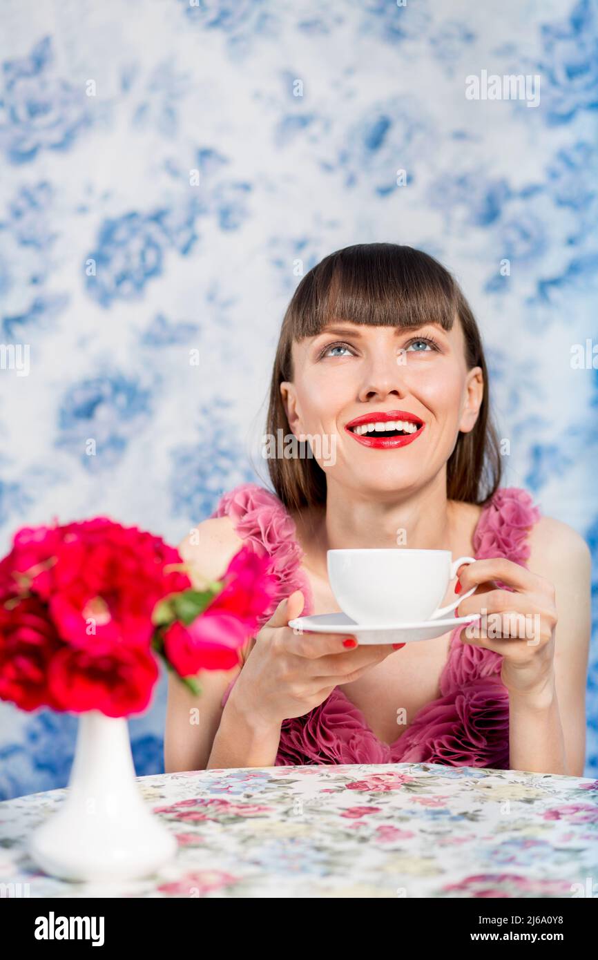 Beautiful woman drinking tea hi-res stock photography and images - Alamy