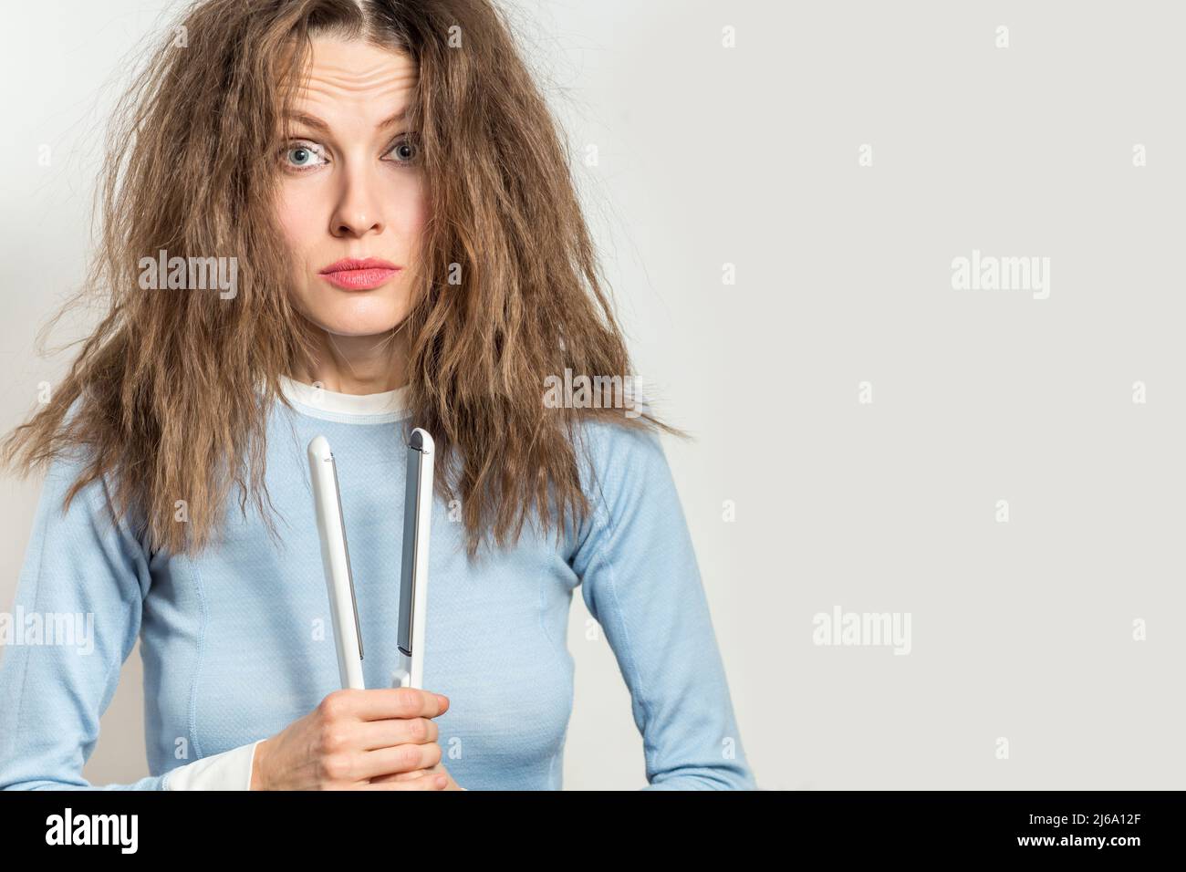 Girl straightening hi-res stock photography and images - Alamy