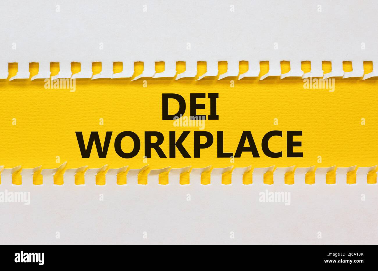 DEI diversity equity inclusion workplace symbol. Yellow paper with ...