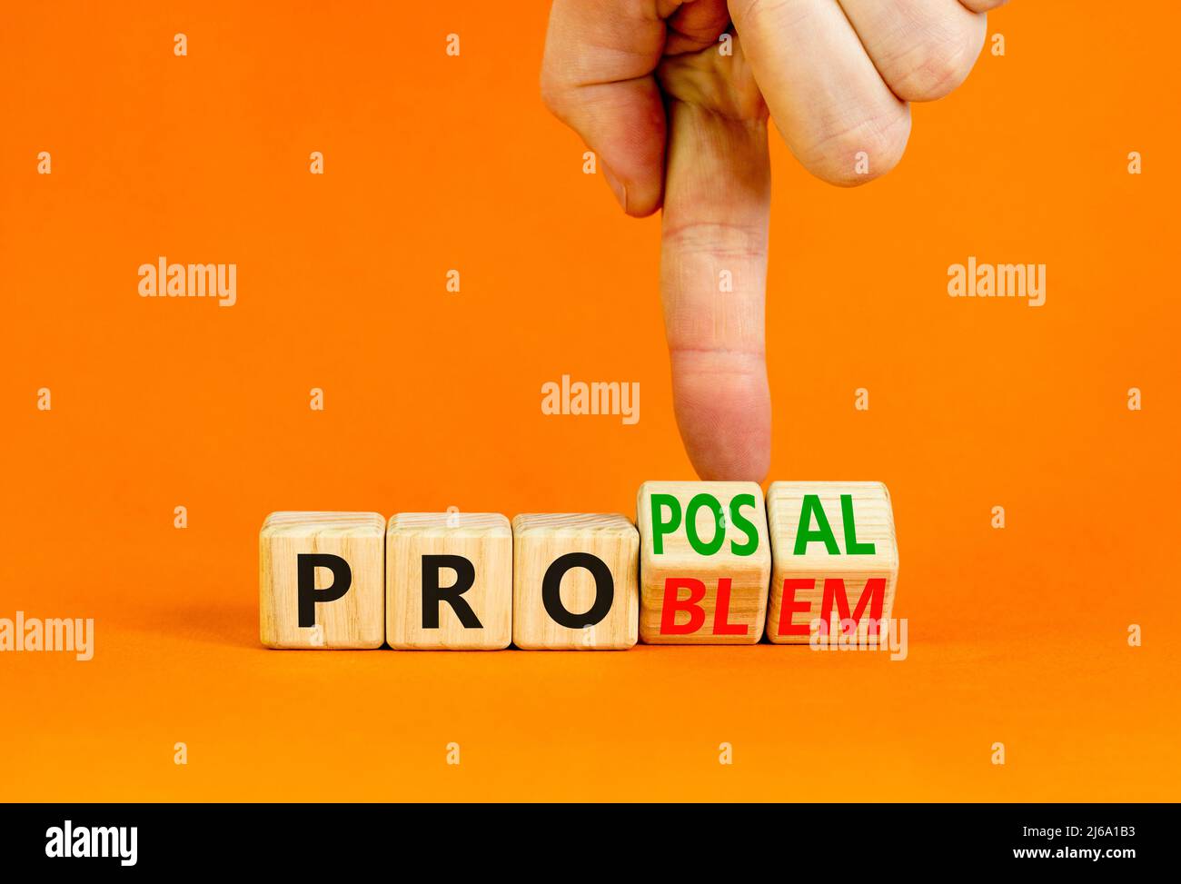 Solving a problem and making proposal symbol. Businessman turns wooden ...