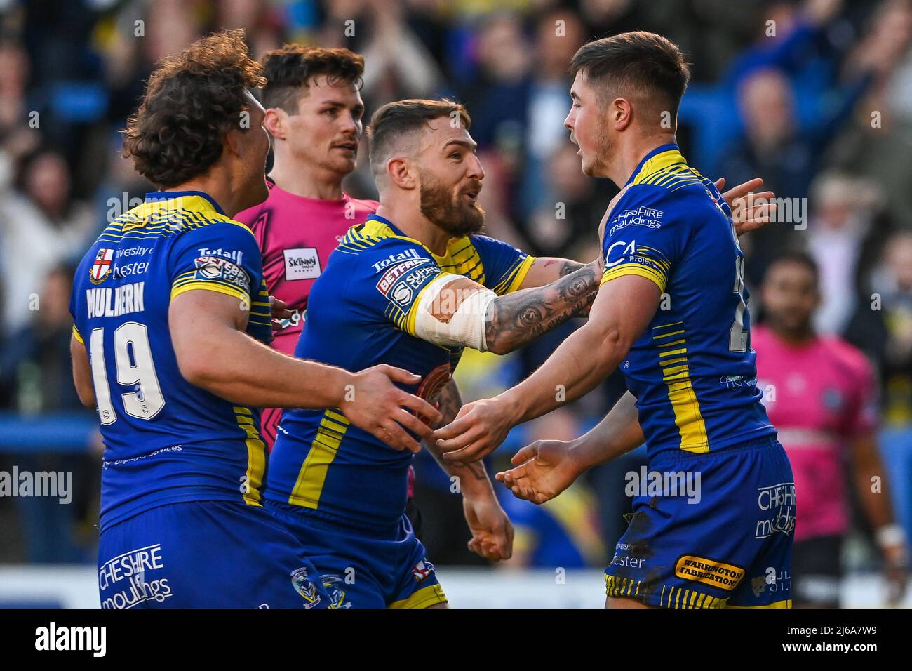 Riley Dean #27 of Warrington Wolves celebrates his try Stock Photo - Alamy