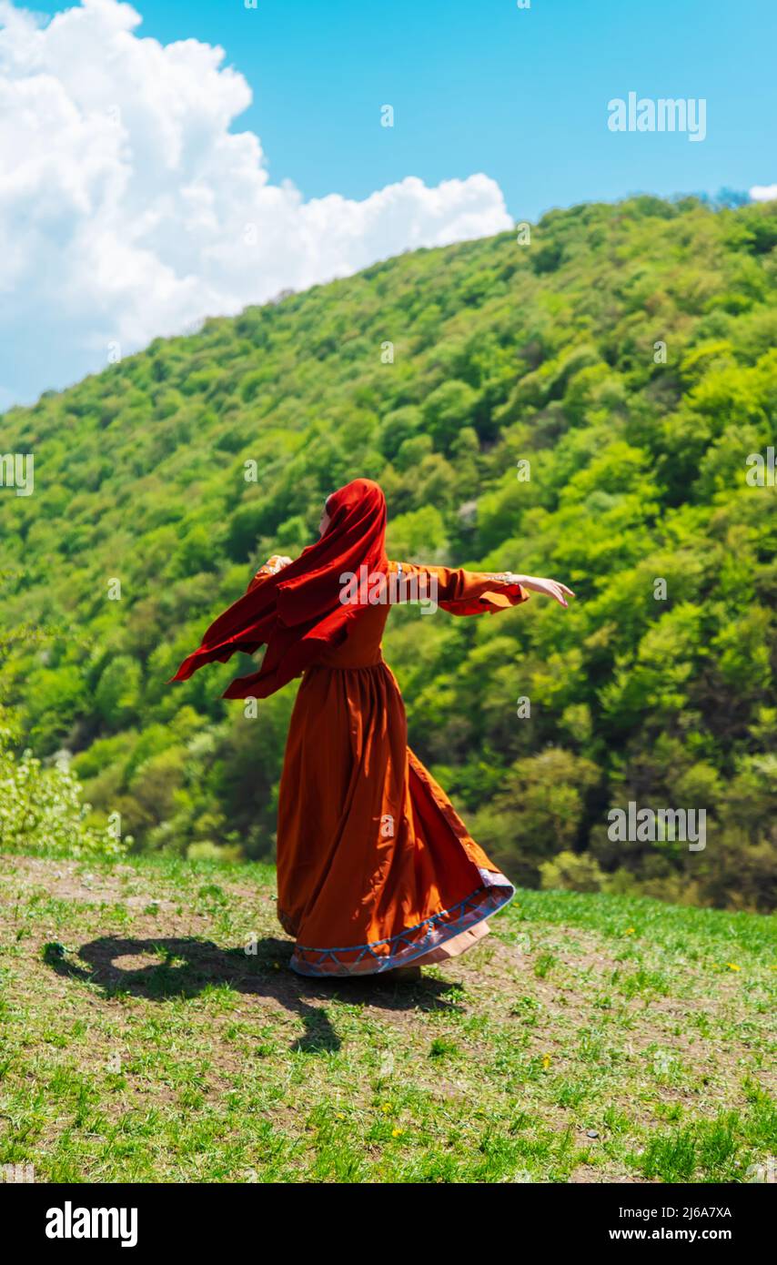 Georgian girl in national costume dances Georgian national dances ...