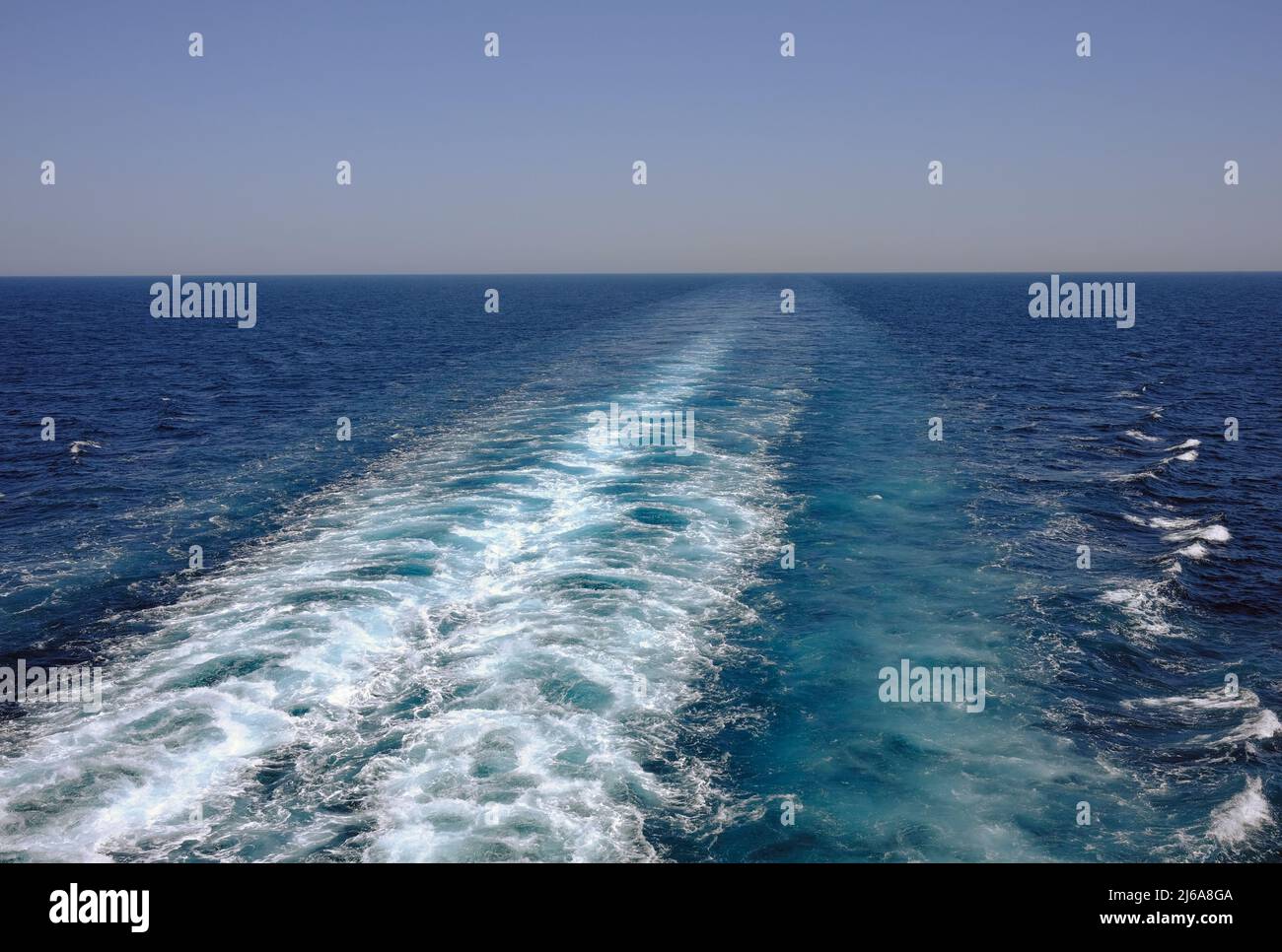 The wake of a Cruise Ship on a calm sea Stock Photo - Alamy
