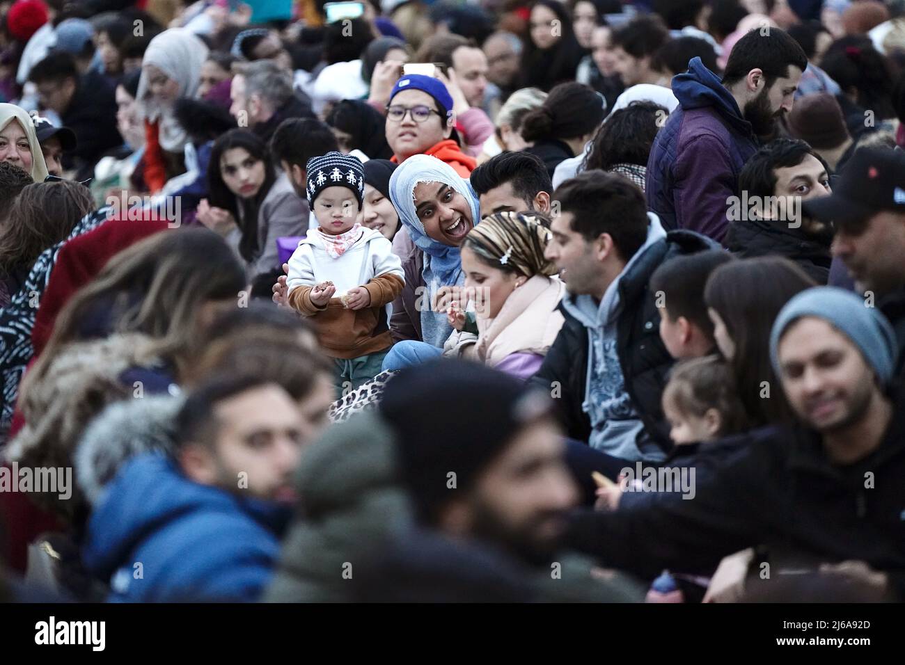 People during an open Iftar to mark the final week of Ramadan ...