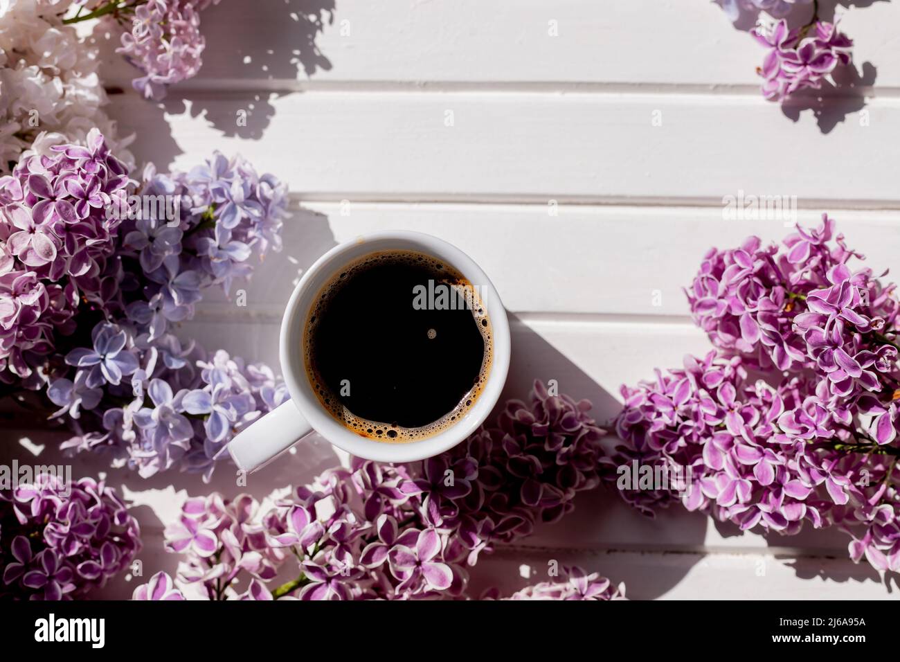 White cup of fresh cappuccino with delicious foam on marble tray with ...