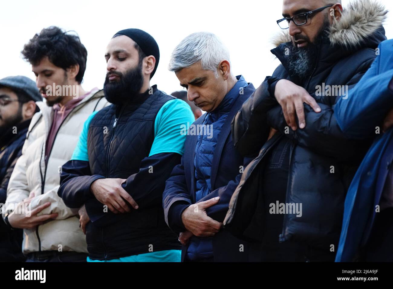 Mayor of London Sadiq Khan (centre-right) praying during an open Iftar ...