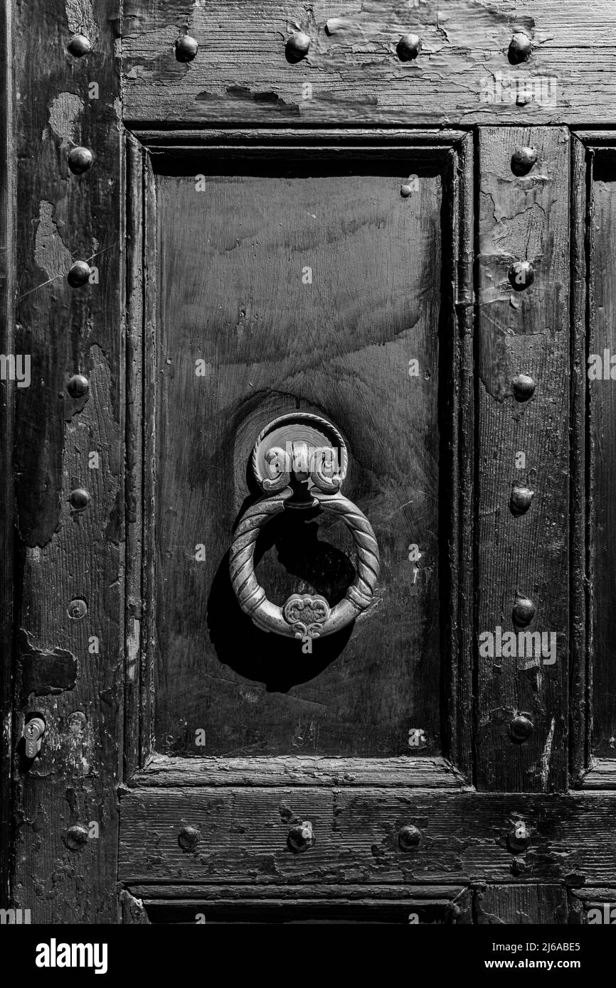 Antique Door handle for knocking on the door Stock Photo - Alamy