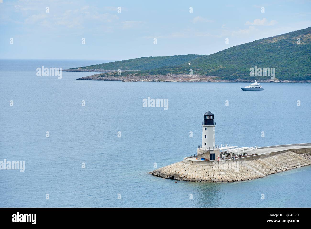 lighthouse in the sea and restaurant, tourist attraction in Montenegro ...
