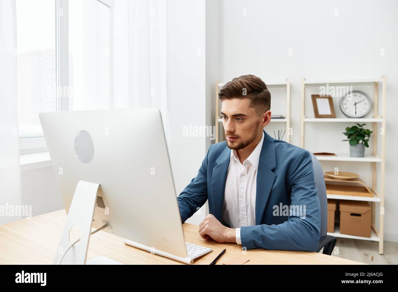 businessmen sitting at the computer work boss isolated background Stock ...