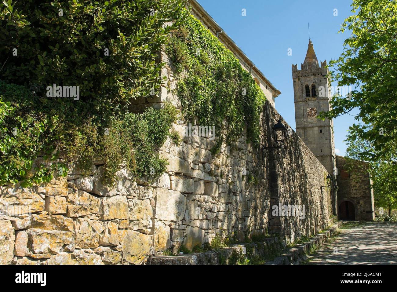 The town walls and belltower of the Parish Church of the Assumption of ...