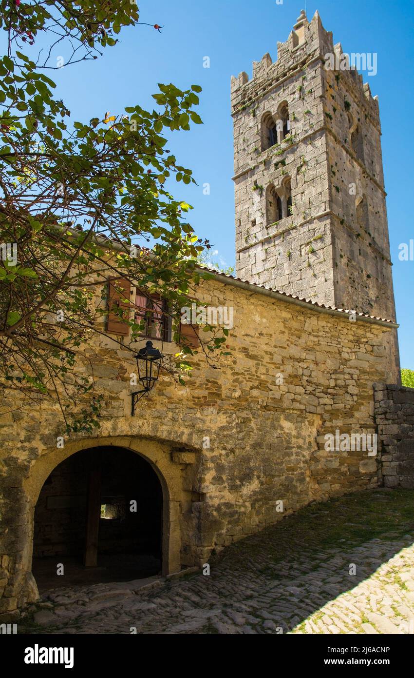 The town walls and belltower of the Parish Church of the Assumption of ...