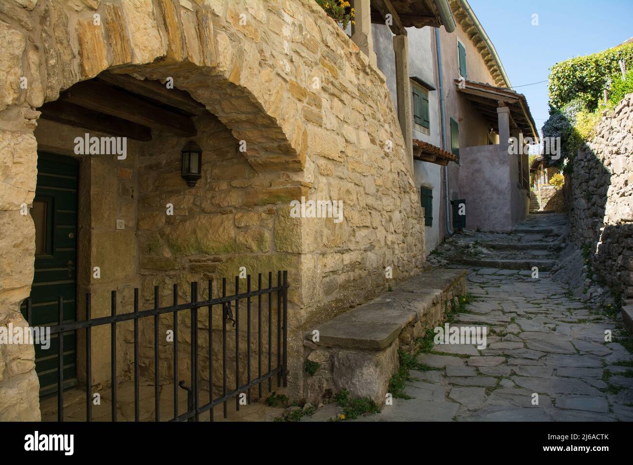 An historic residential street of in the medieval village of Hum in ...