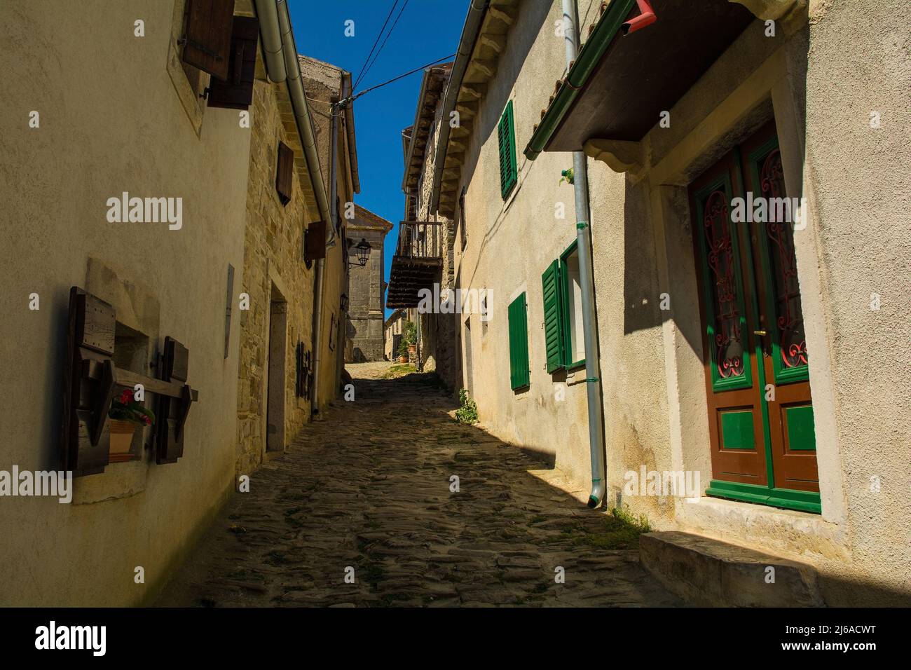 An historic residential street of in the medieval village of Hum in ...