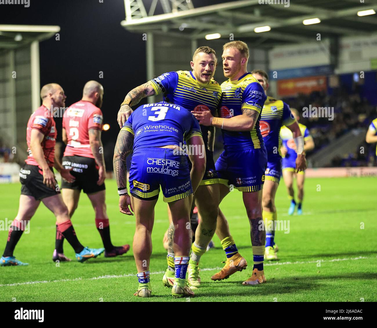 Peter Mata’utia #3 of Warrington Wolves celebrates his try Stock Photo ...