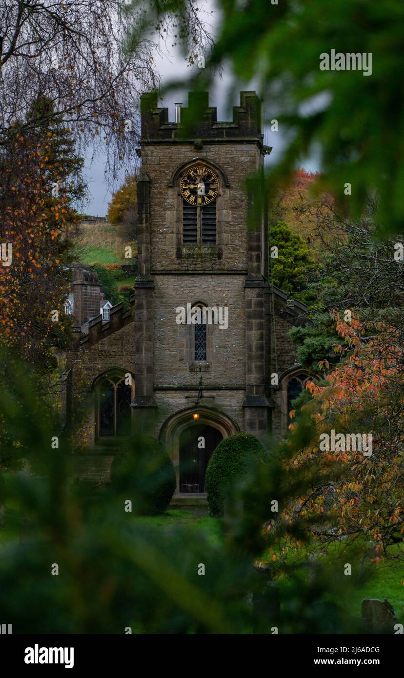 Gloomy Church, taken through surrounding shrubs located near Settle in ...
