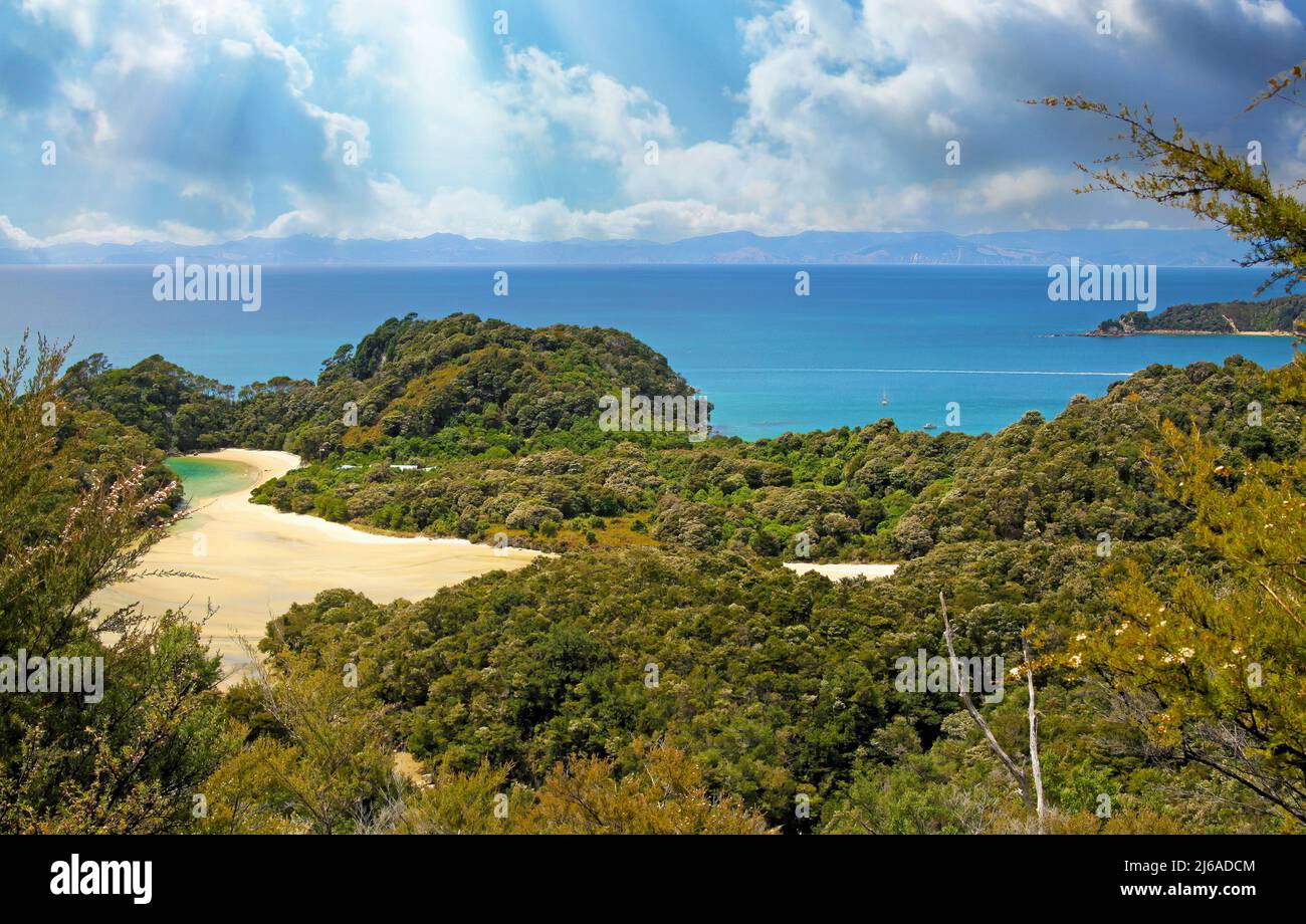 Scenic beautiful ocean valley landscape with sandbanks beach in green ...