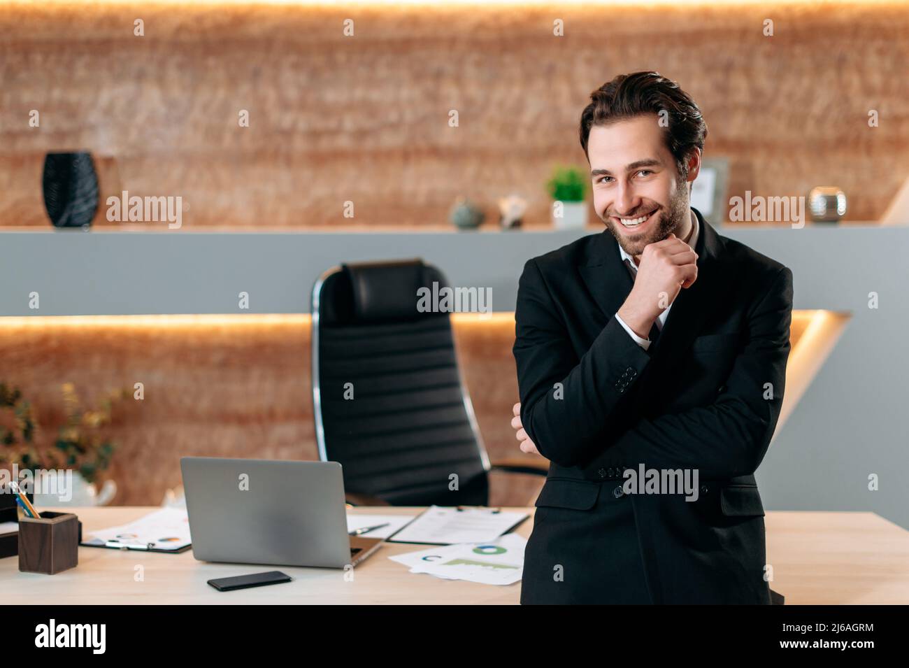 Portrait of an elegant caucasian successful businessman in formal ...